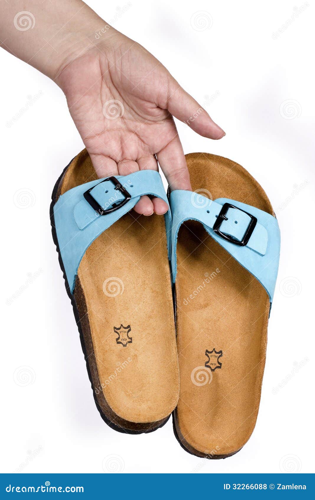 Woman S Hand Holding a Sandals Stock Photo - Image of blue, house: 32266088