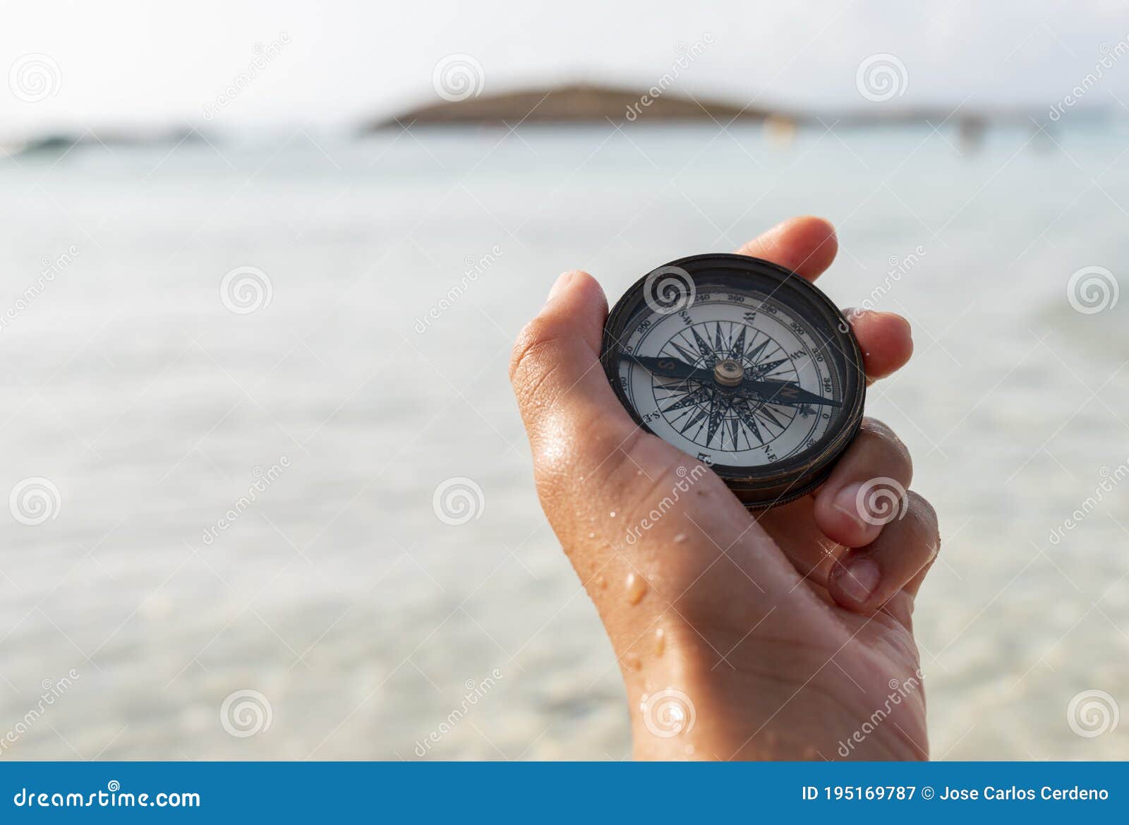 Man Holds A Compass In His Hand. Man Wathing Compass Holding In His ...