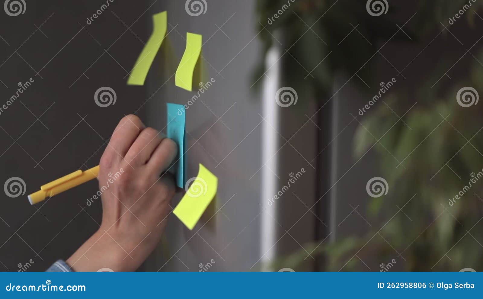 Woman S Hand Makes a Note on a Sticker on the Refrigerator. Planning ...