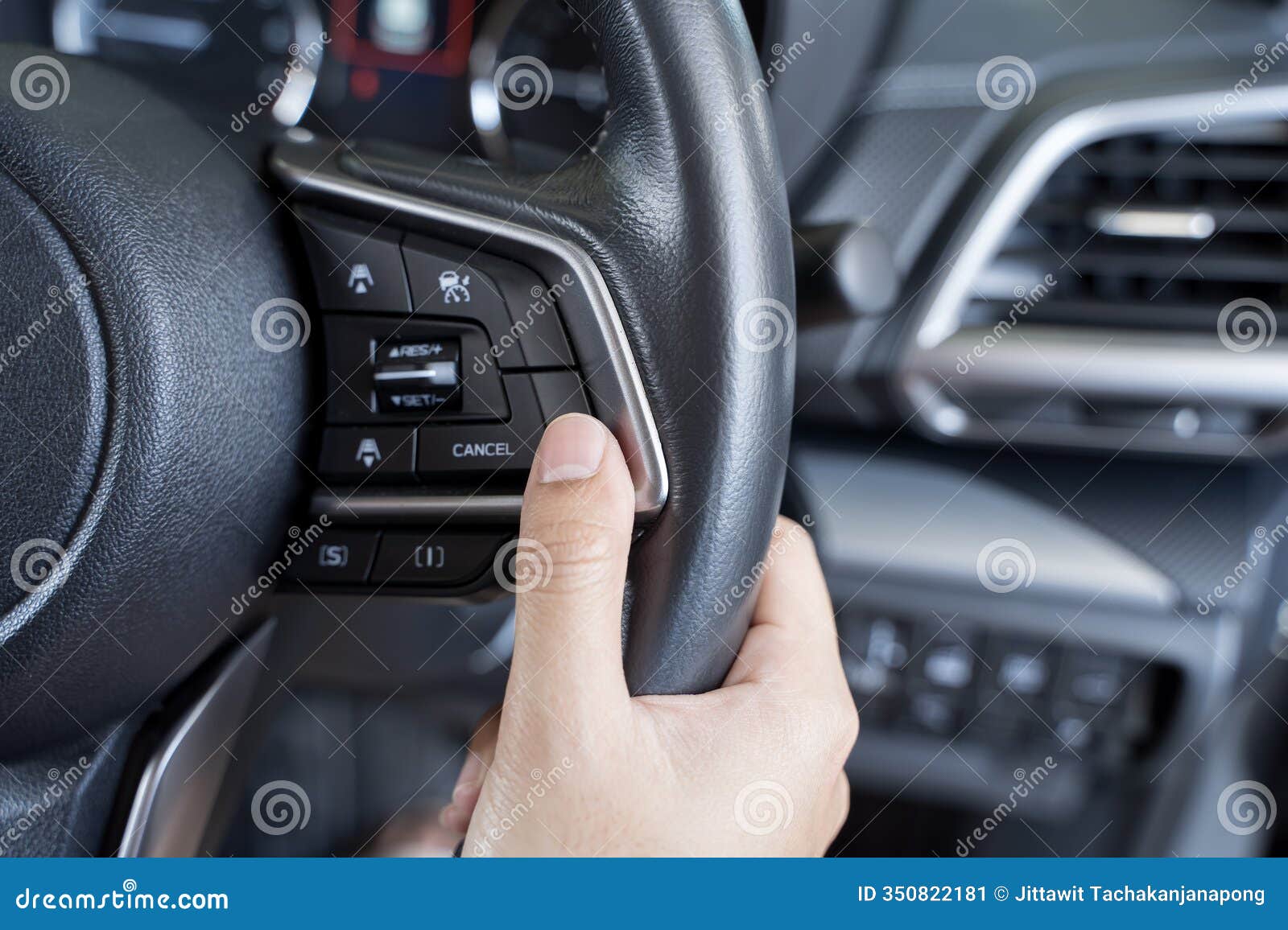 Woman S Hand Presses the Button on the Steering Wheel of the Car Close ...
