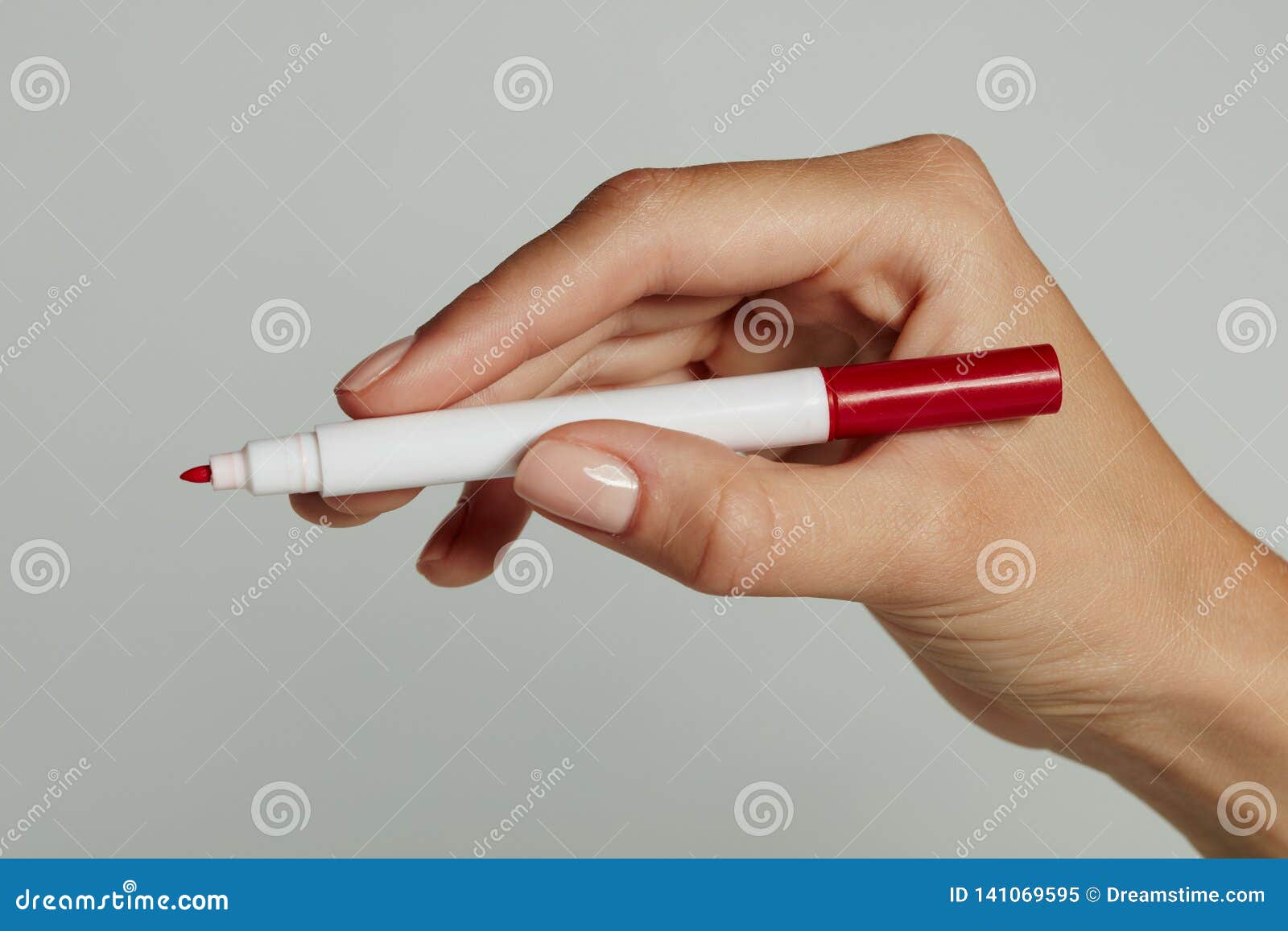 A Woman`s Hand with Red Pen. Stock Image - Image of caucasian, floor ...