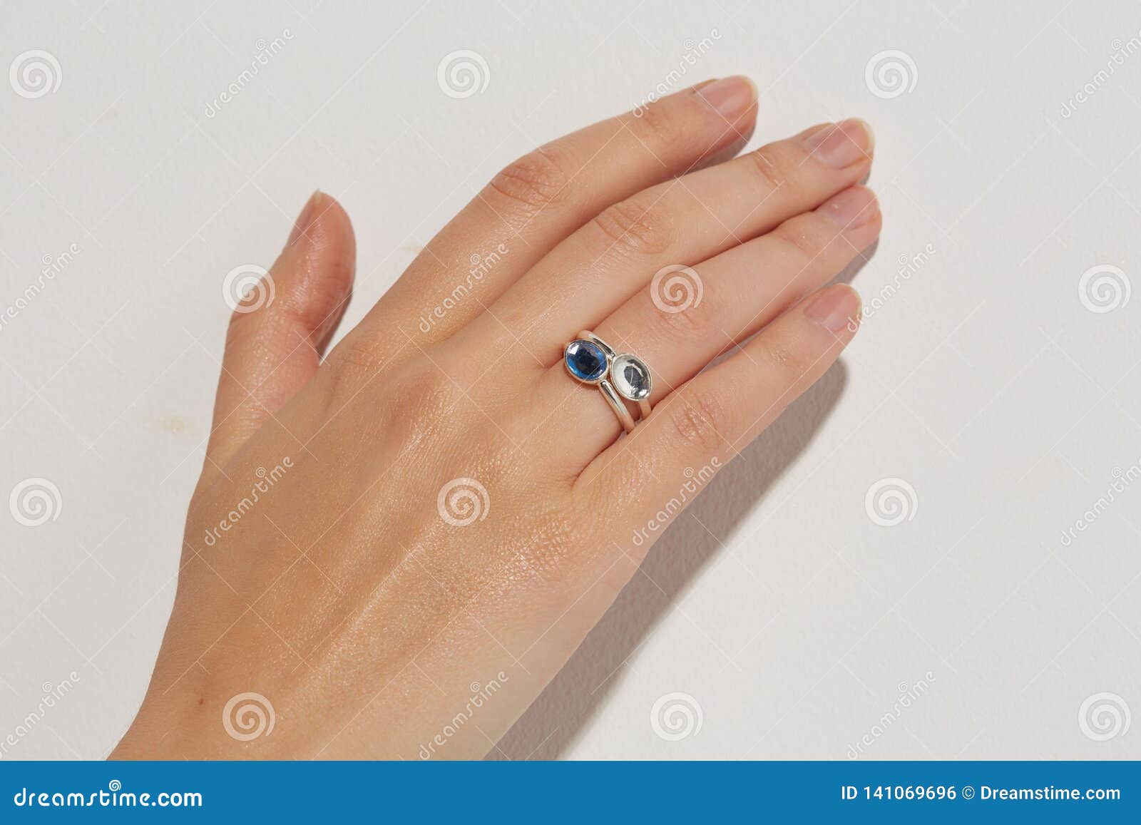 A Woman`s Hand with a Ring. Stock Photo - Image of clothing ...