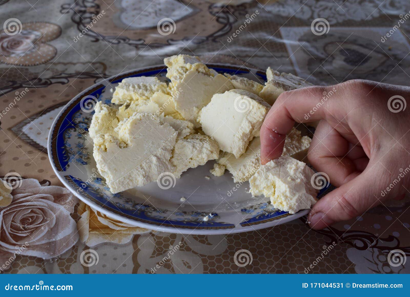 A Woman`s Hand Taking Cheese from a Plate Stock Image - Image of ...