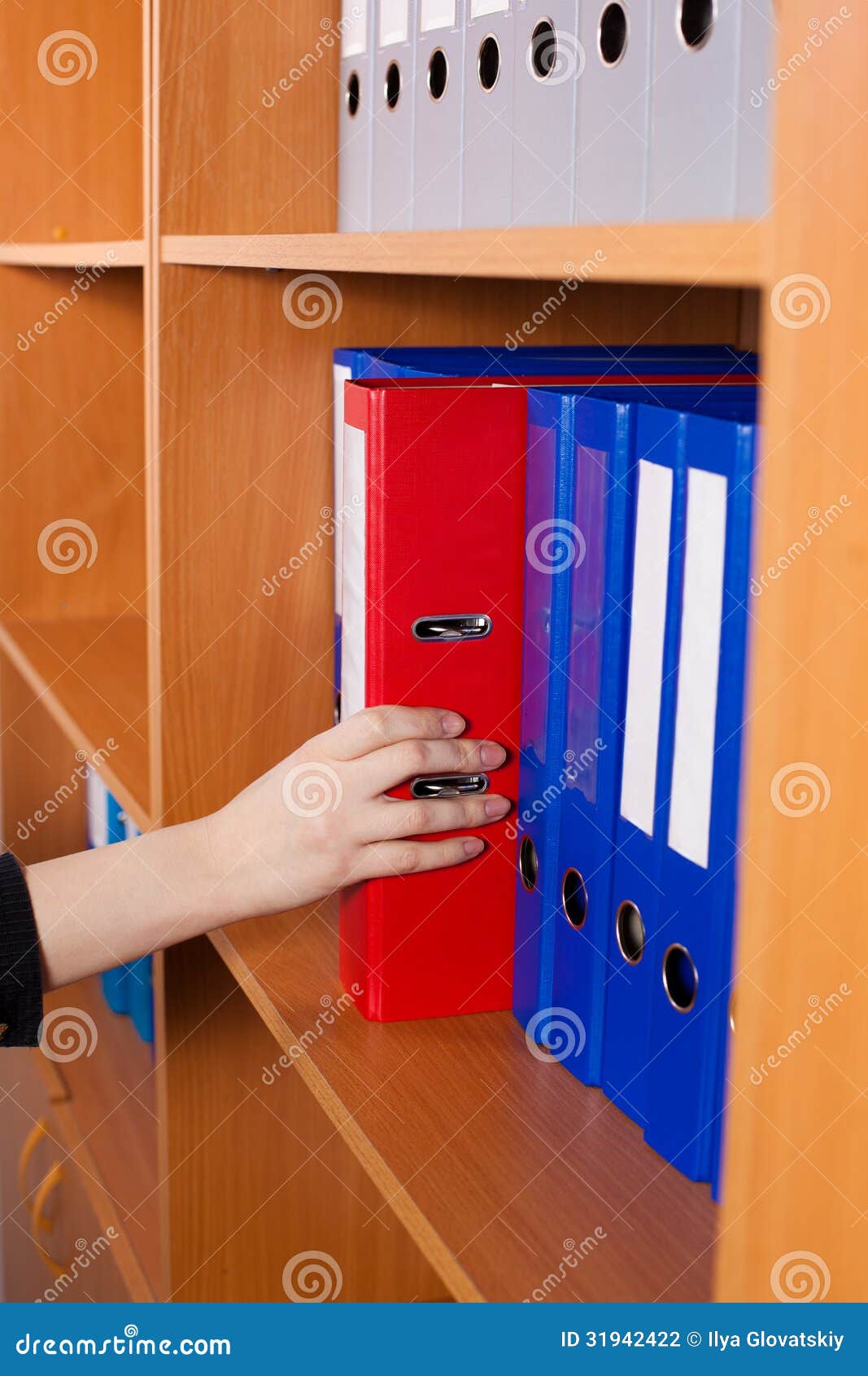 Woman S Hand Taking a Red Folder from Shelf Stock Photo - Image of ...