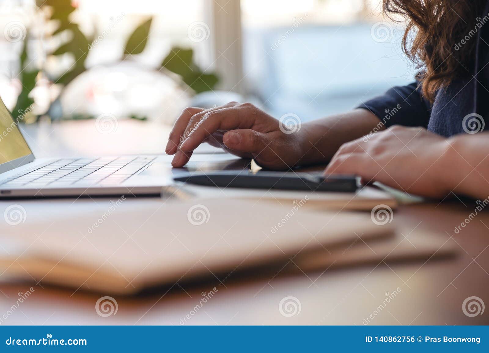A Woman`s Hand Using and Touching on Laptop Touchpad with Notebooks and ...