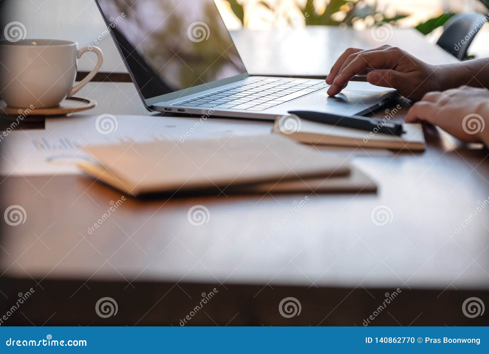 A Woman`s Hand Using and Touching on Laptop Touchpad with Notebooks and ...