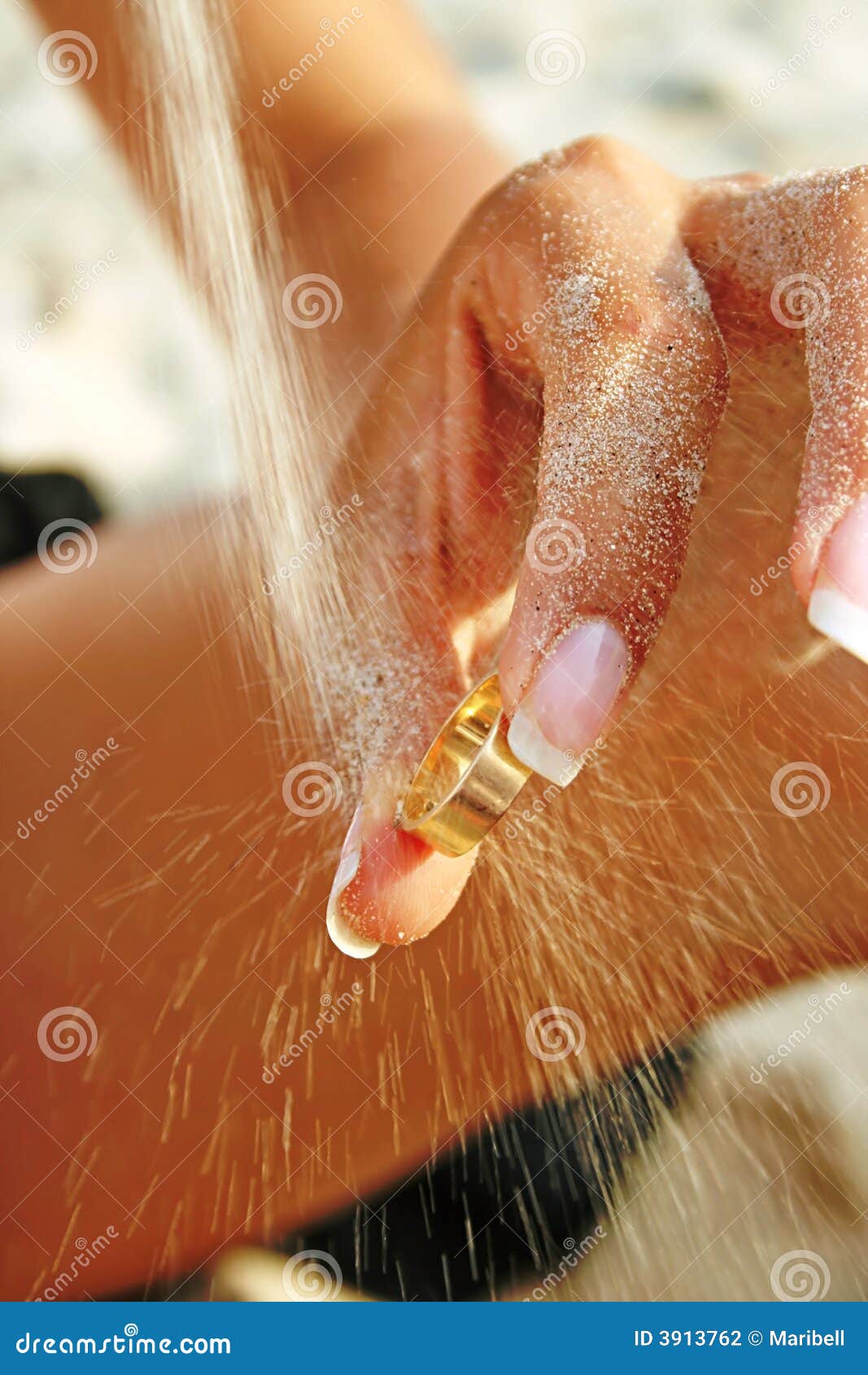 Woman S Hand with Wedding Ring and Sand Passing by Stock Photo - Image ...