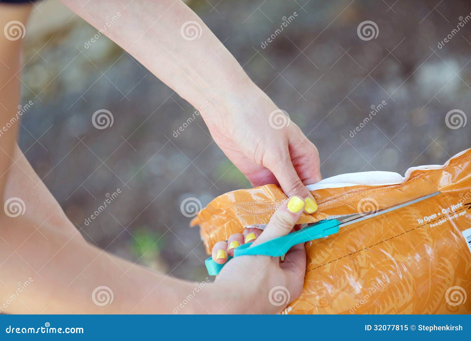 Woman S Hands Cut Open a Large Bag Stock Image - Image of dirt, cutting ...