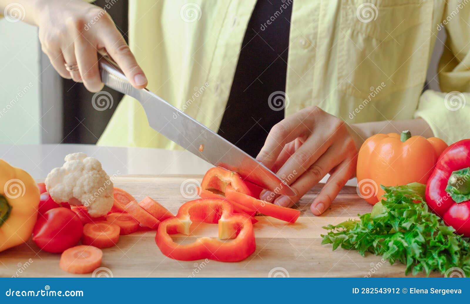 Woman S Hands Cutting Vegetables in the Kitchen Close-up Stock Photo ...
