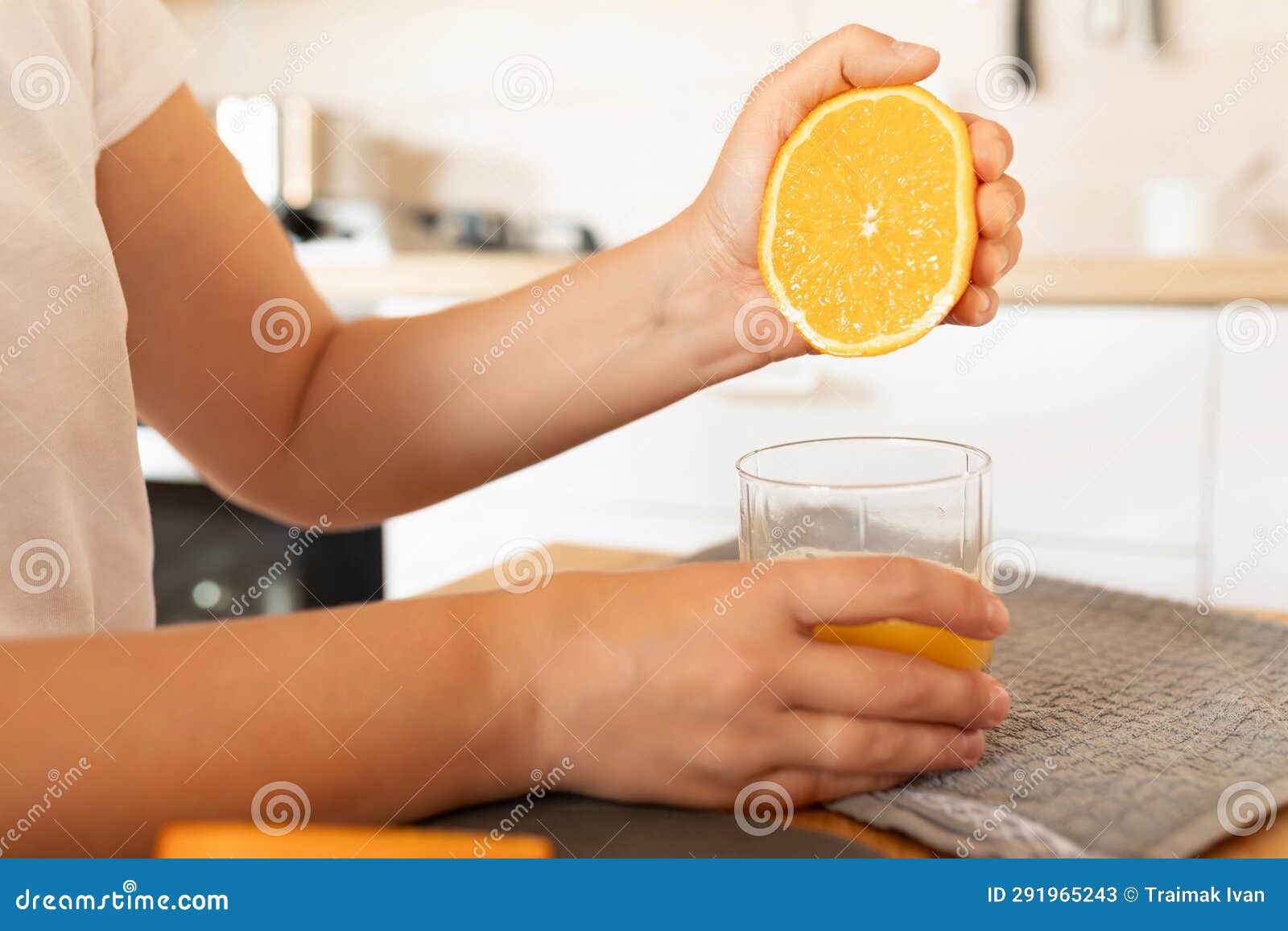 A Woman& X27;s Hands Squeeze an Orange for Juice Stock Image - Image of ...