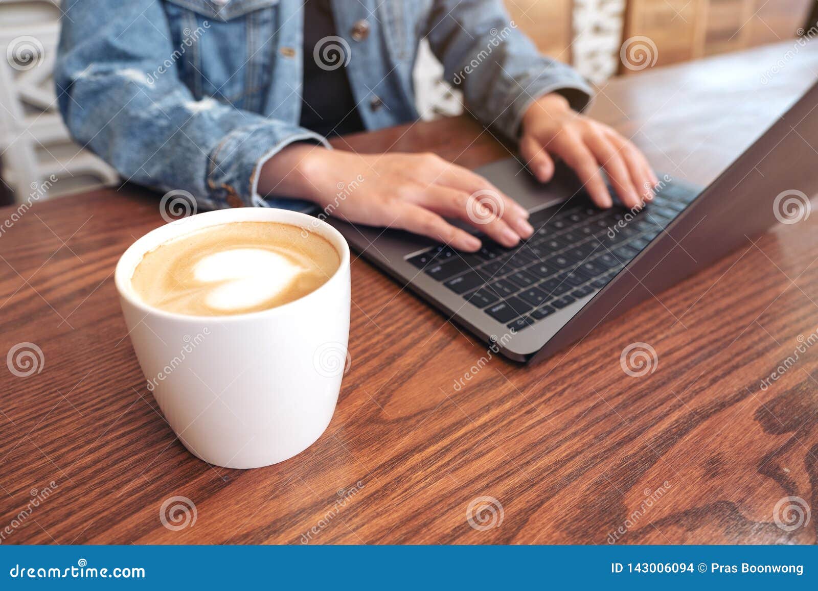Woman`s Hands Using and Typing on Laptop Computer Keyboard with Coffee ...