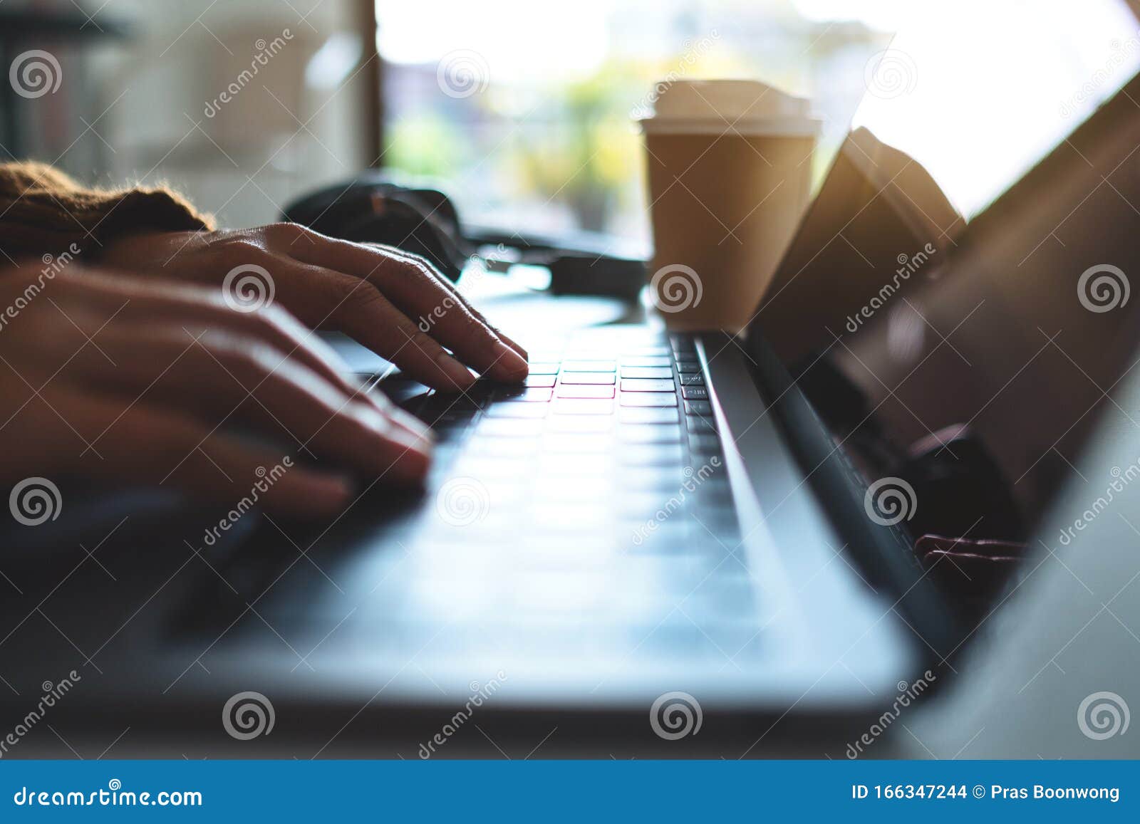A Woman`s Hands Working and Typing on Laptop Computer on the Table ...