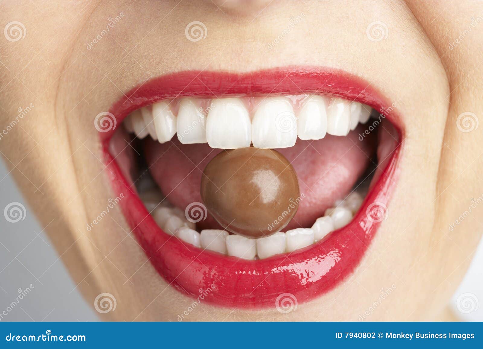Woman S Mouth Biting on Chocolate Stock Photo - Image of glamorous ...