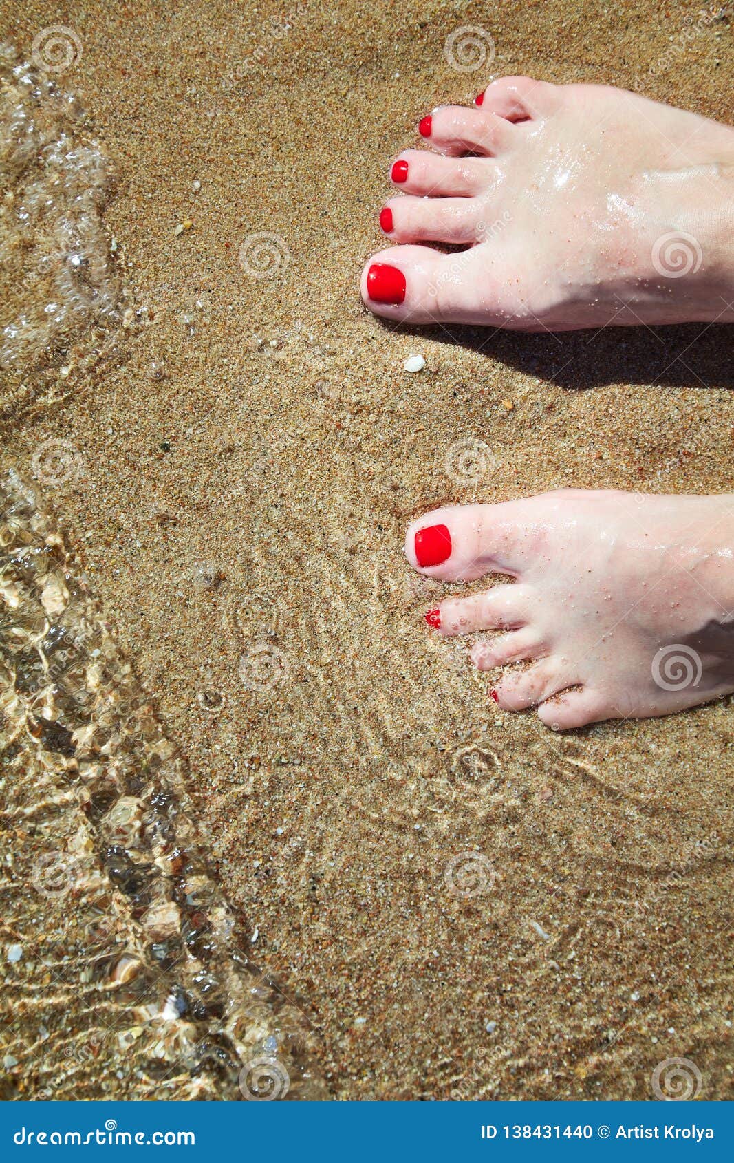 Woman`s Pedicured Feet with Red Nail Polish on Toes in the Sand in ... Woman`s Pedicured Feet with Red Nail Polish on Toes in the Sand in ...