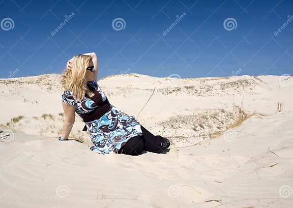 Woman in Sand stock photo. Image of female, blue, sitting - 2375830