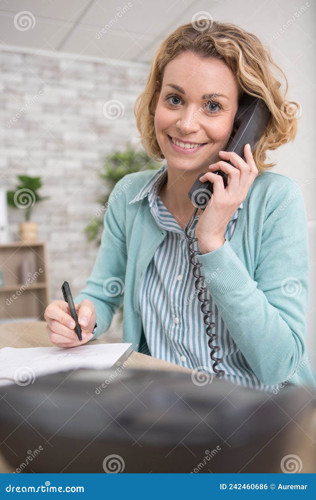 Woman Sat at Desk Using Telephone Switchboard Stock Photo - Image of ...