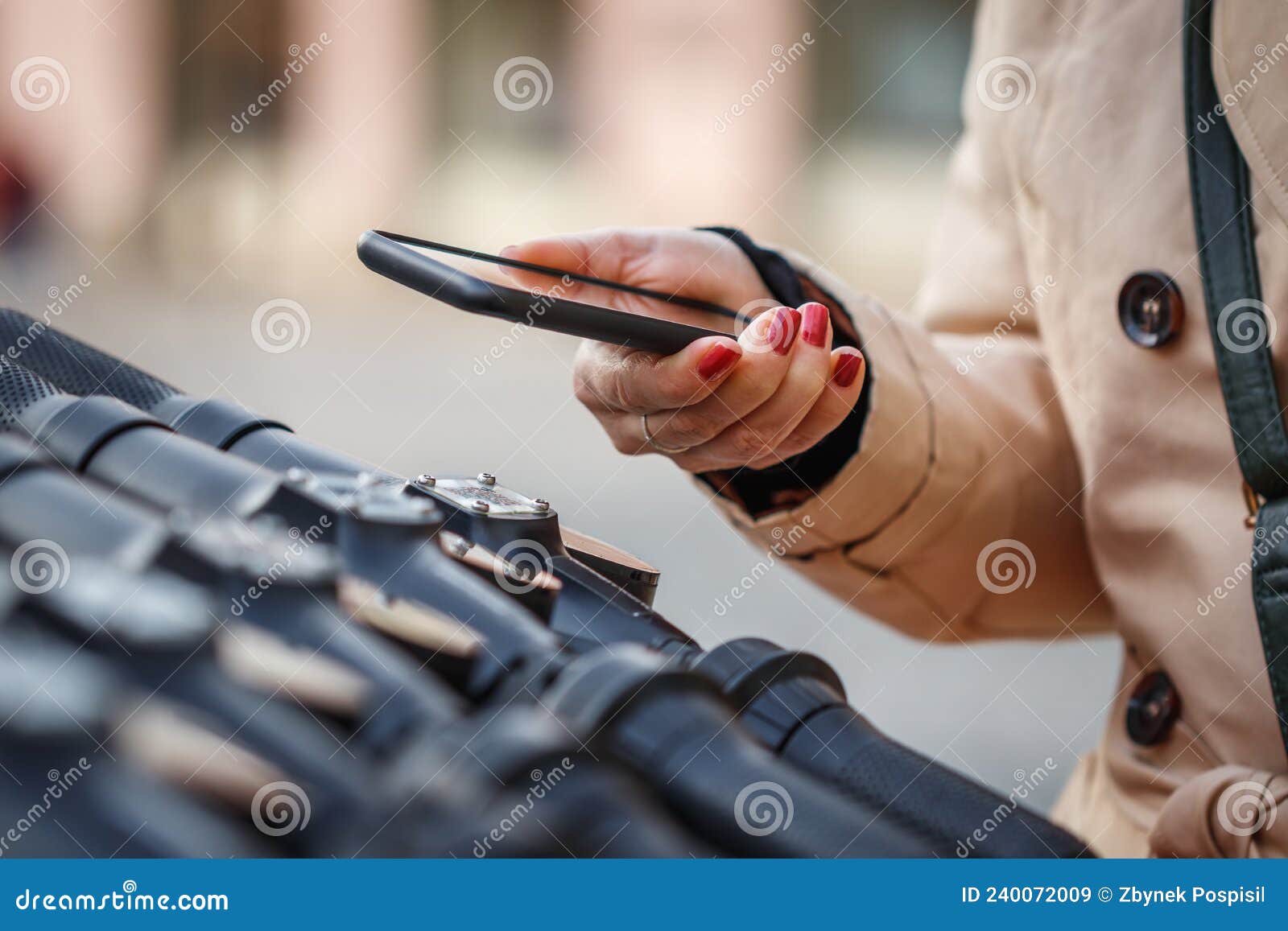 Woman Scan QR Code by Smart Phone To Unlock and Rent Electric Push ... Woman Scan QR Code by Smart Phone To Unlock and Rent Electric Push ...