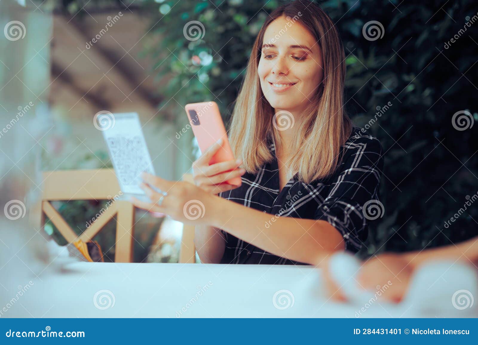 Woman Scanning QR Code for Restaurant Menu Using Mobile App Stock Image ...
