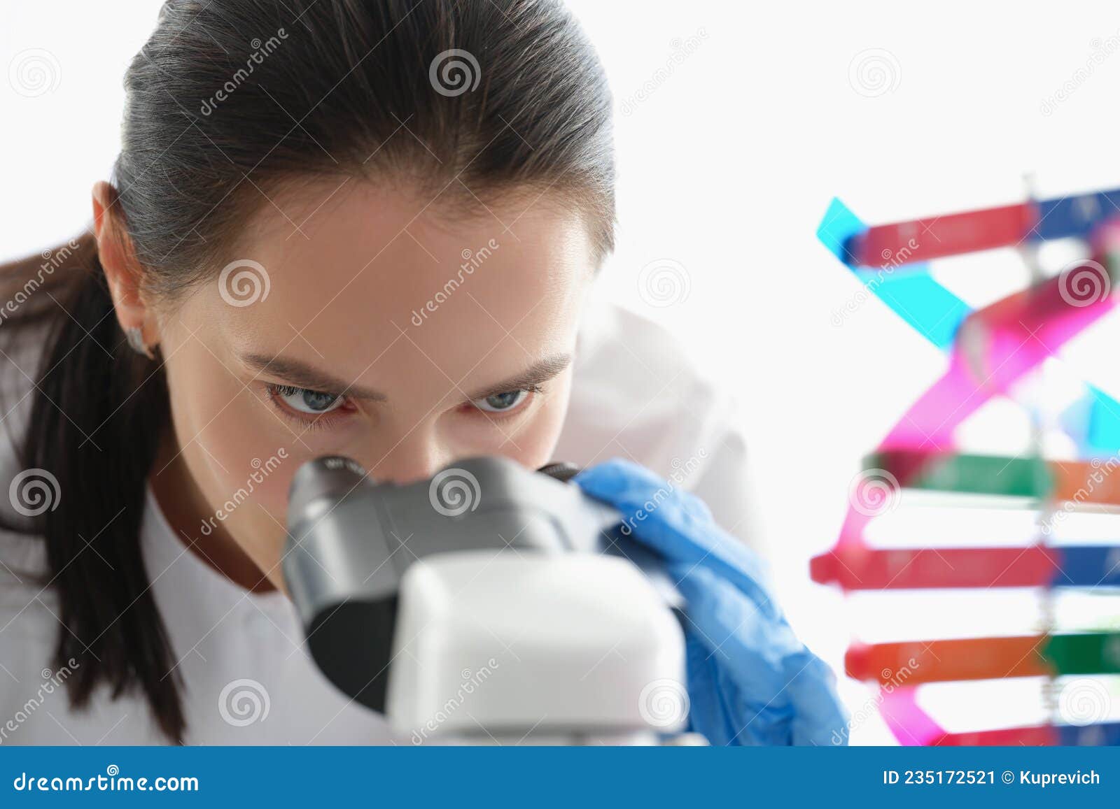 Woman Scientist Looking through a Microscope, Studying Dna Stock Image ...