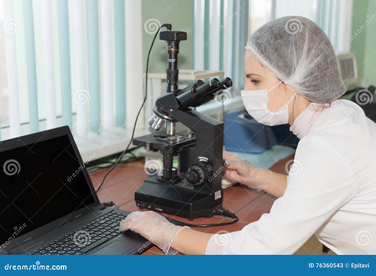 Woman Scientist Looking in a Microscope Stock Image - Image of lens ...