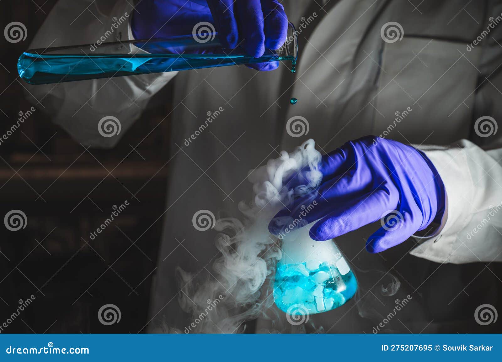 Scientist Performing A Lab Analysis Using A Clinical Chemistry Analyzer ... Scientist Performing A Lab Analysis Using A Clinical Chemistry Analyzer ...