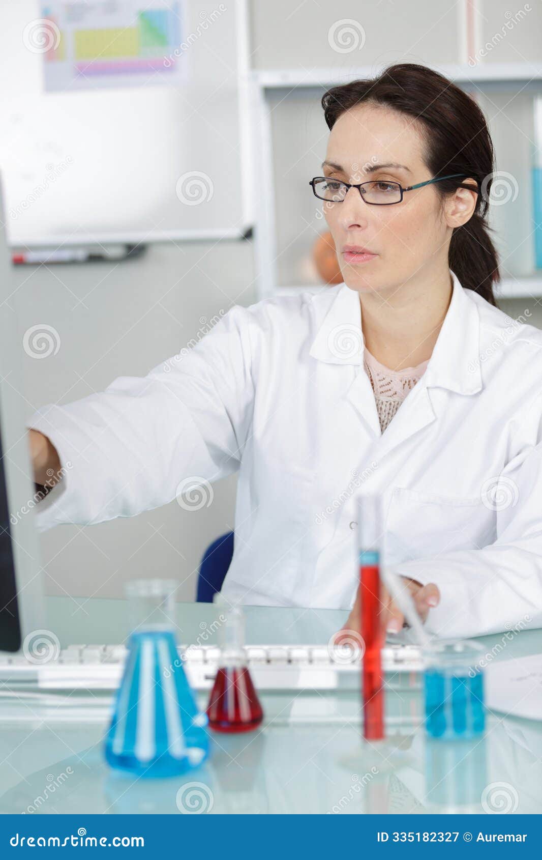 Woman Scientist Studying Chemical Liquid in Lab Flask Stock Image ...