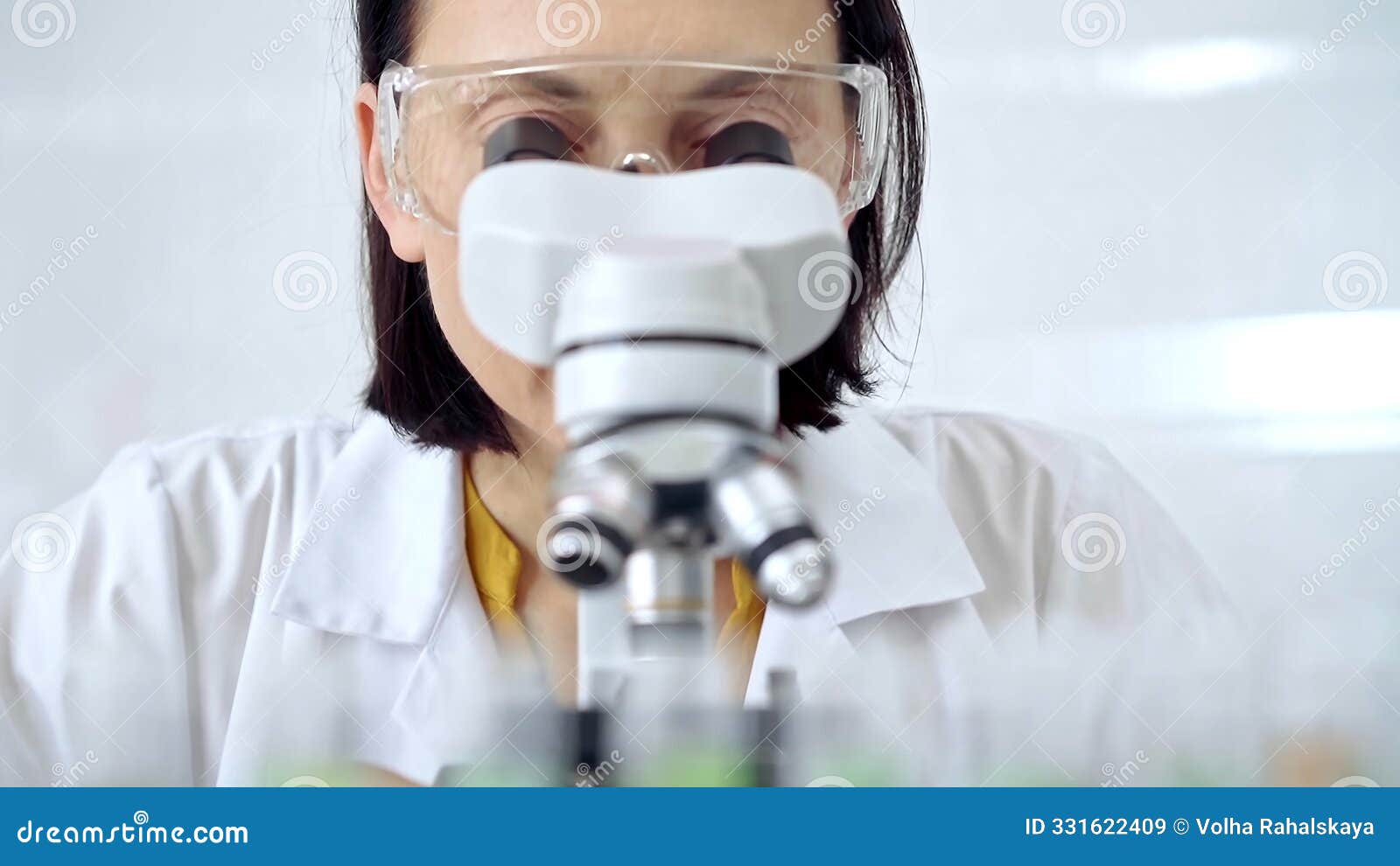 Woman Scientist Using Microscope in Laboratory. Microbiology Science ...