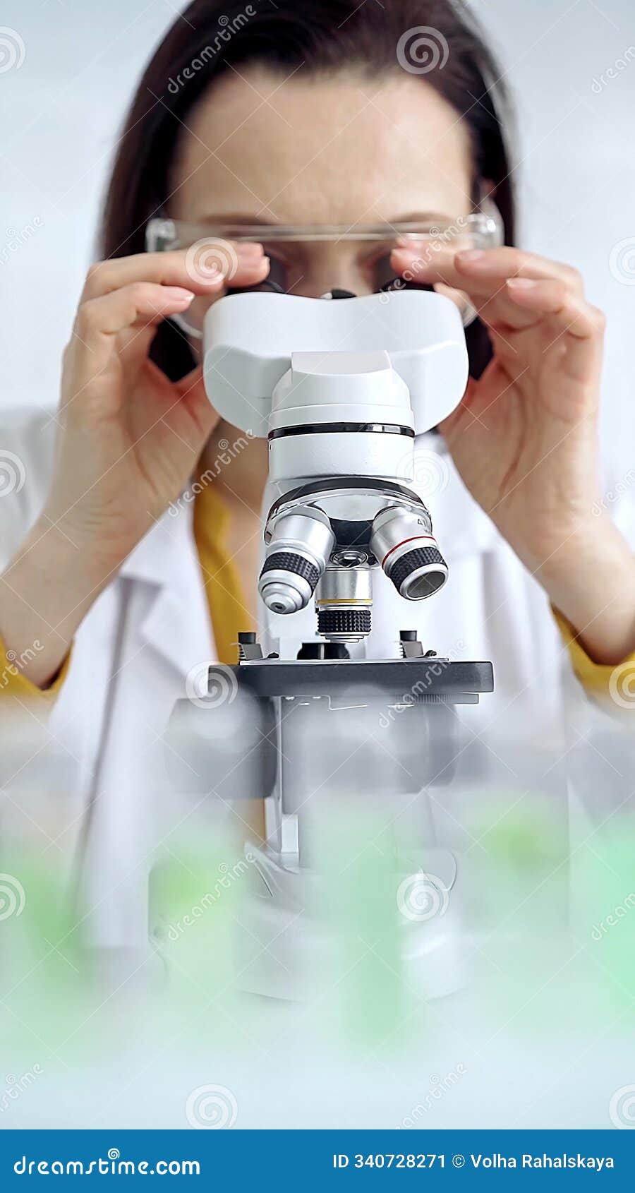Woman Scientist Using Microscope in Laboratory. Microbiology Science ...