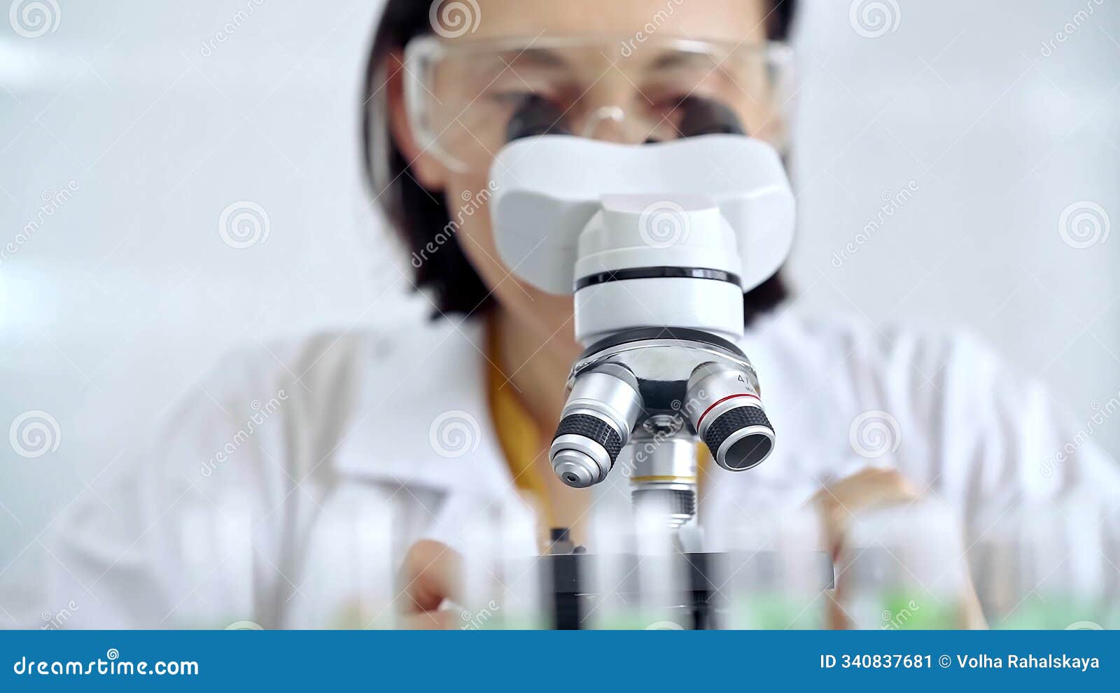 Woman Scientist Using Microscope in Laboratory. Microbiology Science ...