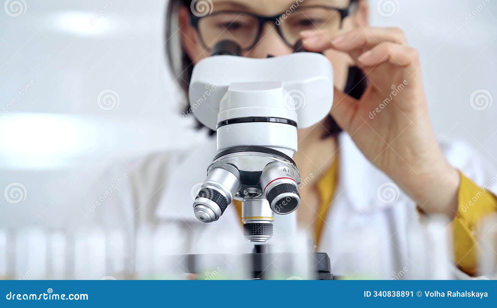 Woman Scientist Using Microscope in Laboratory. Microbiology Science ...