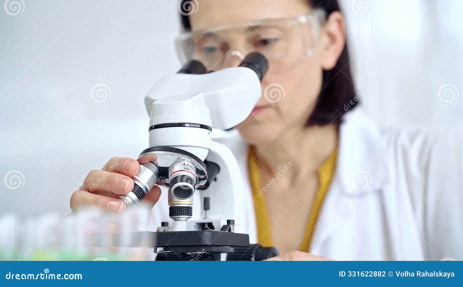 Woman Scientist Using Microscope in Laboratory. Microbiology Science ...