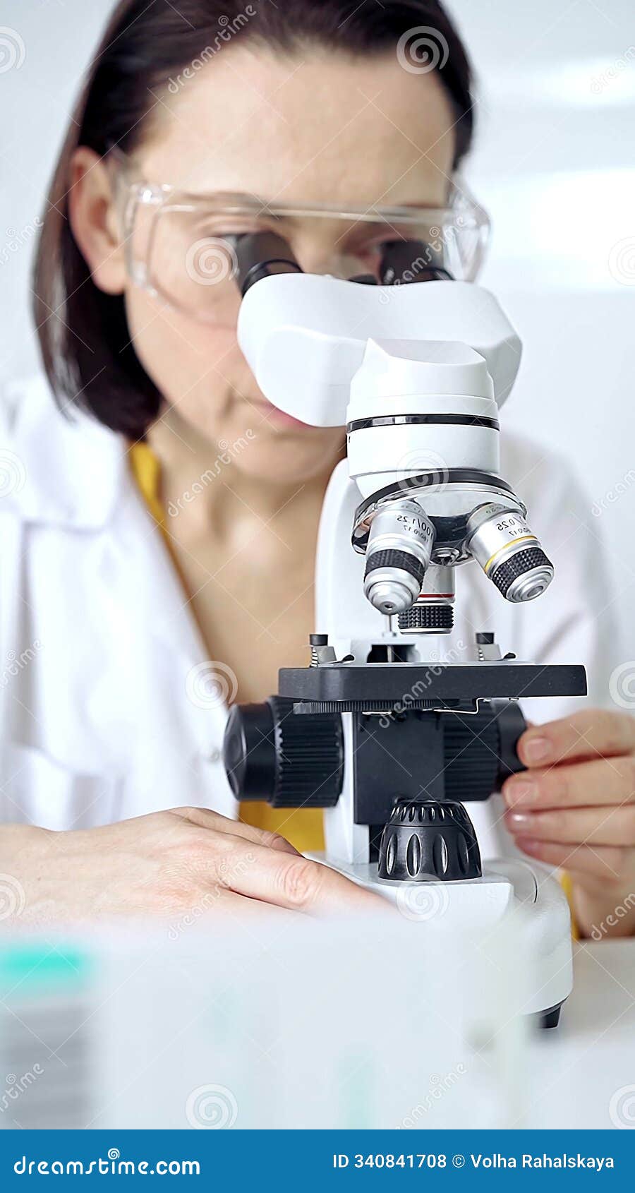 Woman Scientist Using Microscope in Laboratory. Microbiology Science ...