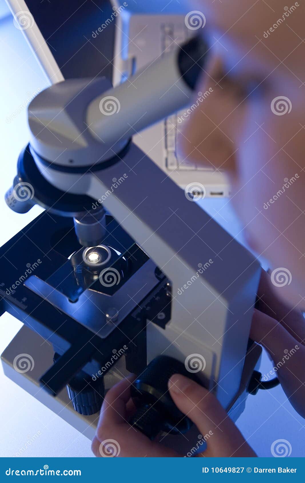 Woman Scientist Using a Microscope and Laptop Stock Image - Image of ...