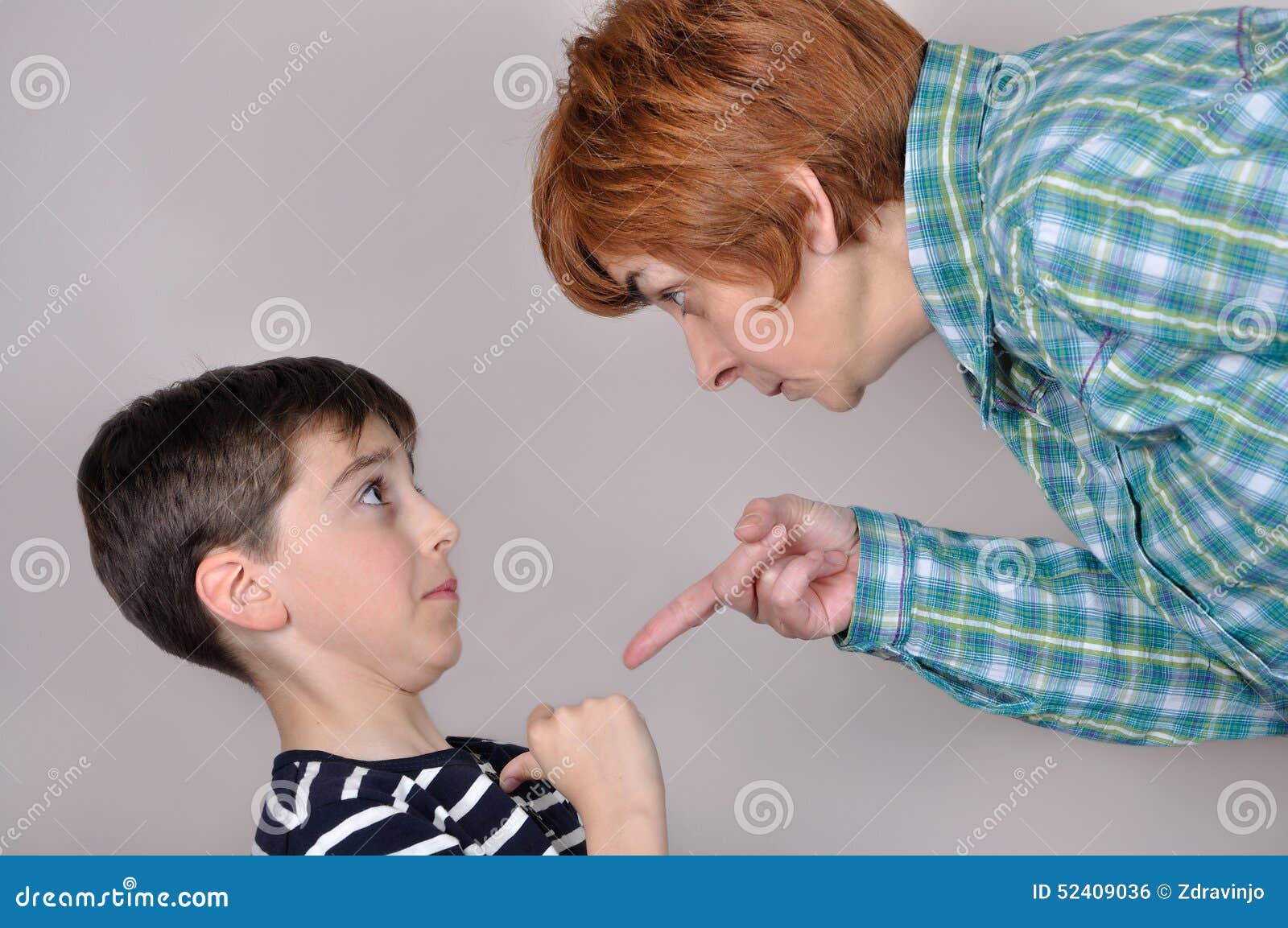 Woman Scolding a Scared Young Boy Stock Photo - Image of family, force ...