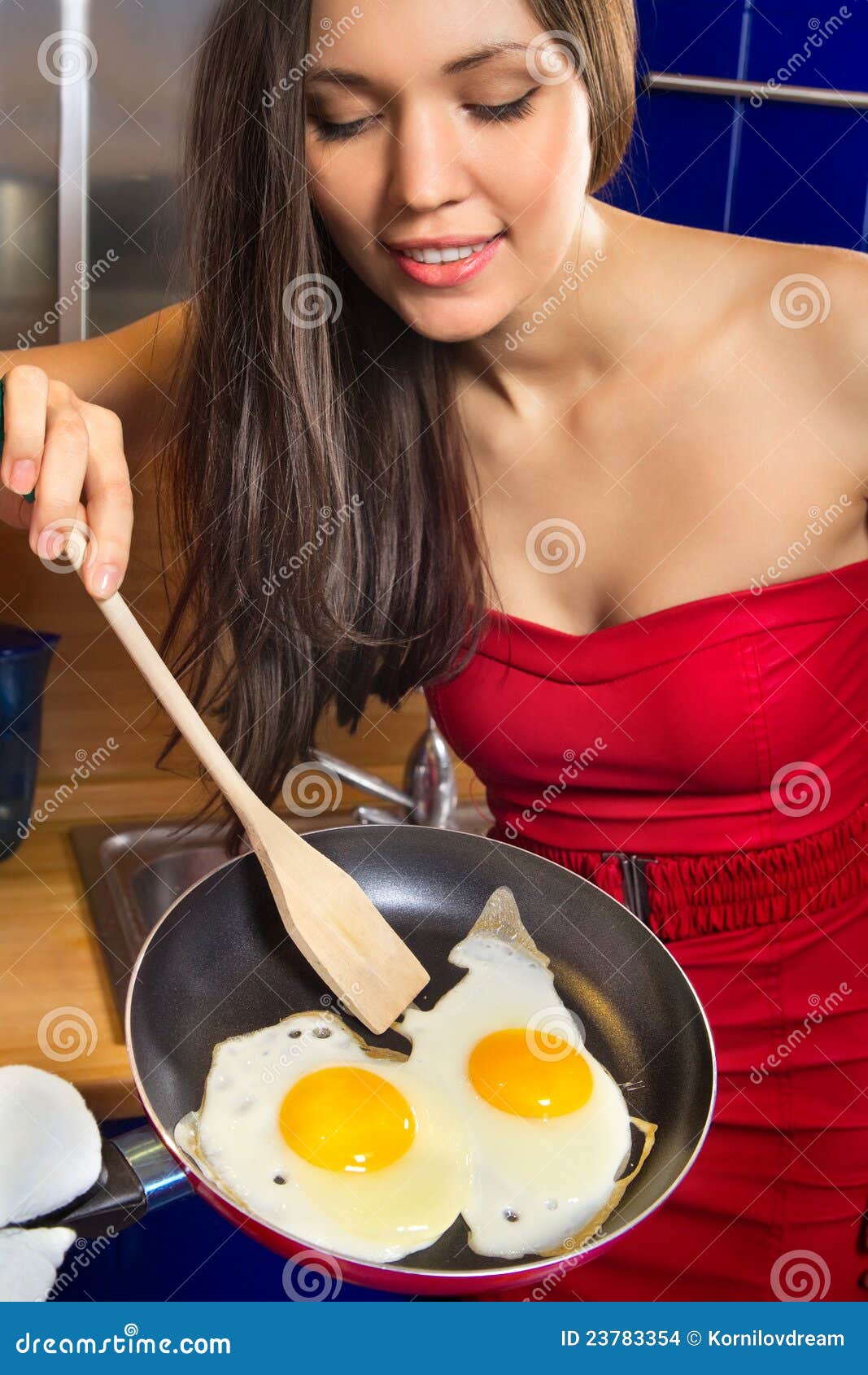 Woman with scrambled eggs stock photo. Image of chef - 23783354