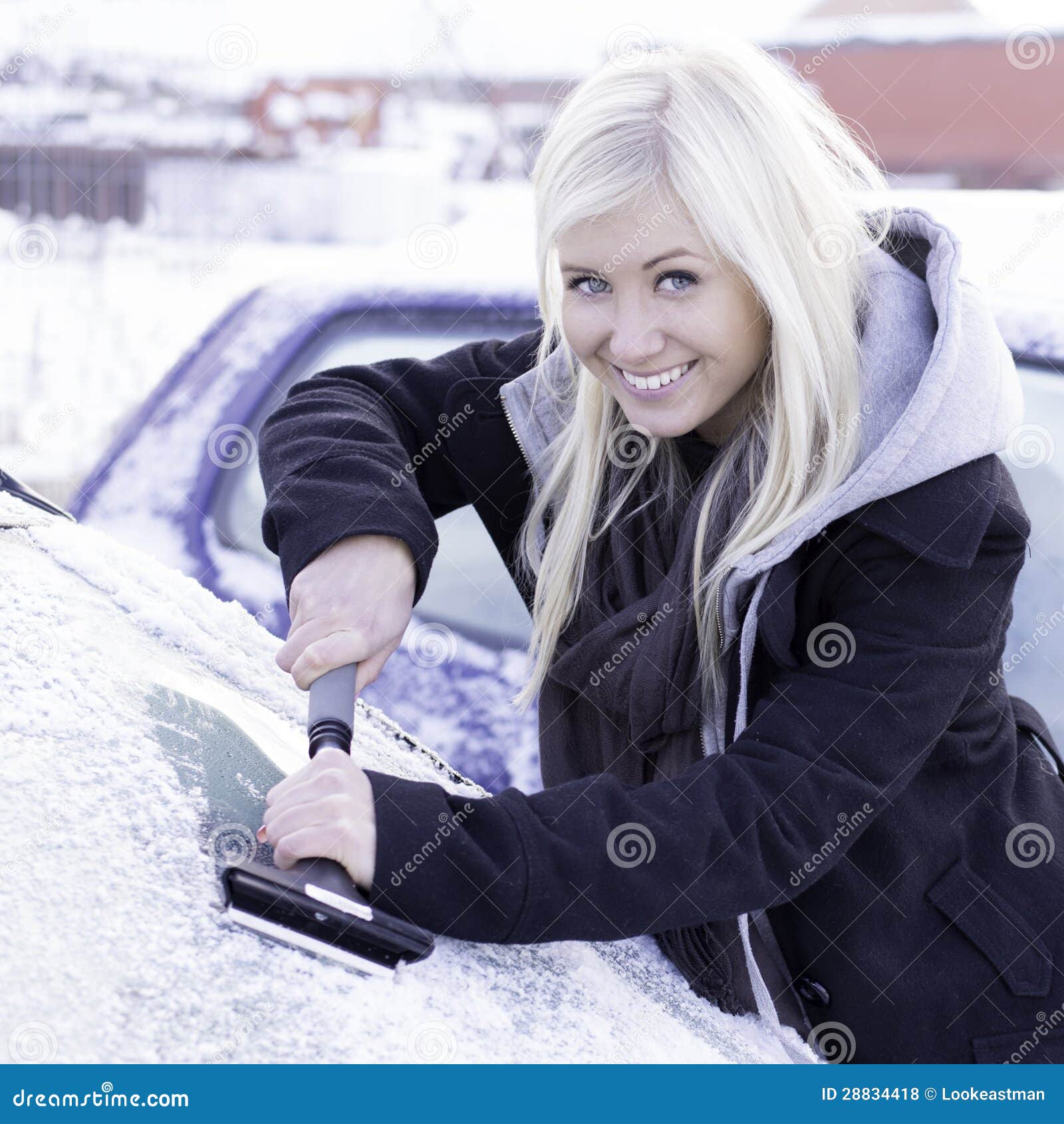 Woman scraping ice stock photo. Image of cold, jacket - 28834418
