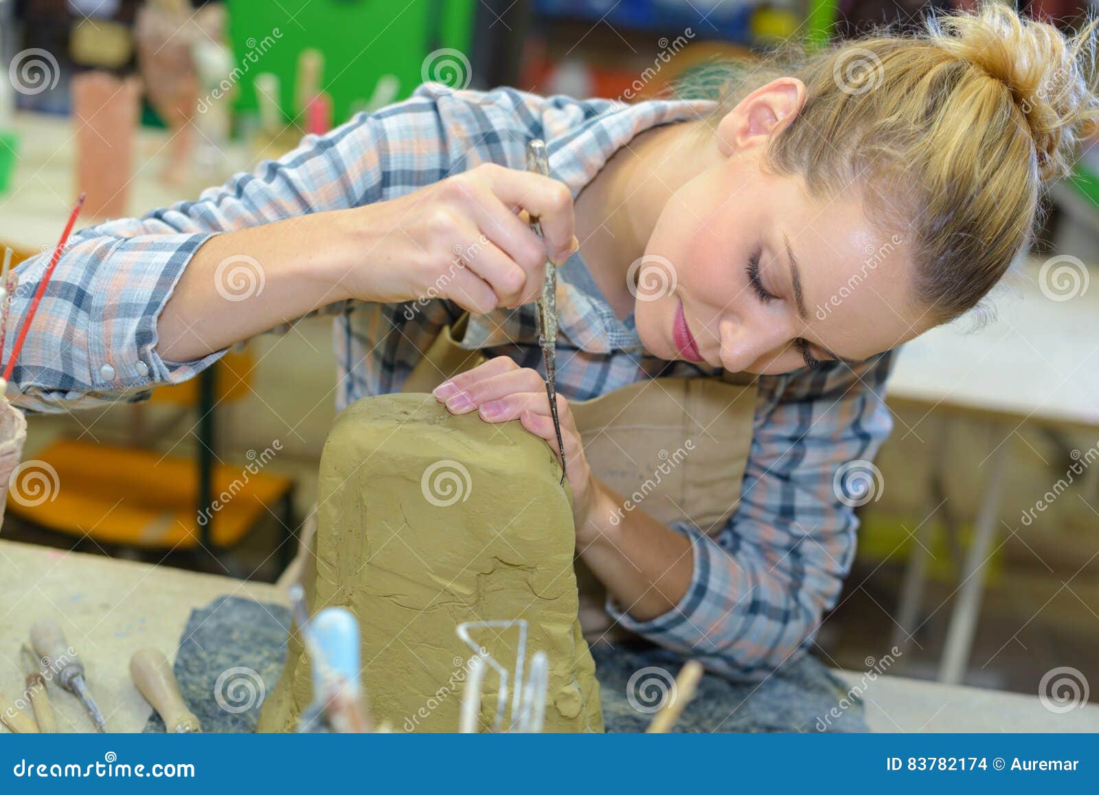 Woman scraping mold clay stock photo. Image of form, clay - 83782174