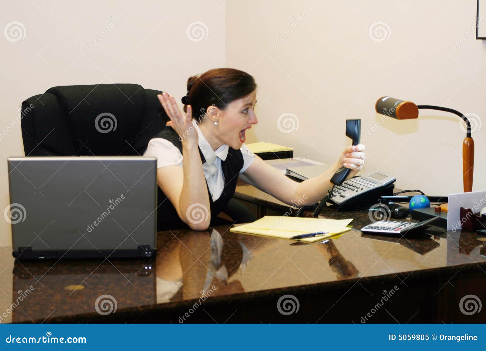 Woman Screaming at Phone stock image. Image of enraged - 5059805