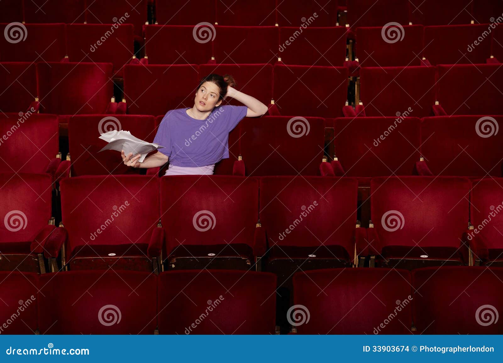 Woman with Script at Theatre Stall Stock Photo - Image of bored, seat ...