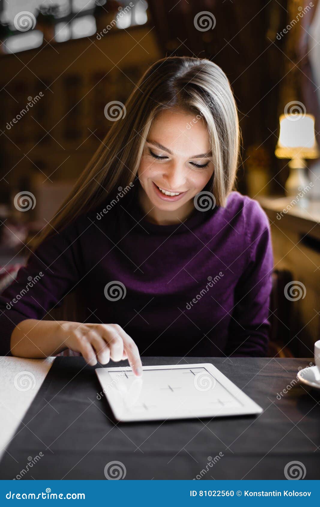 Woman scrolling tablet stock photo. Image of woman, touching - 81022560