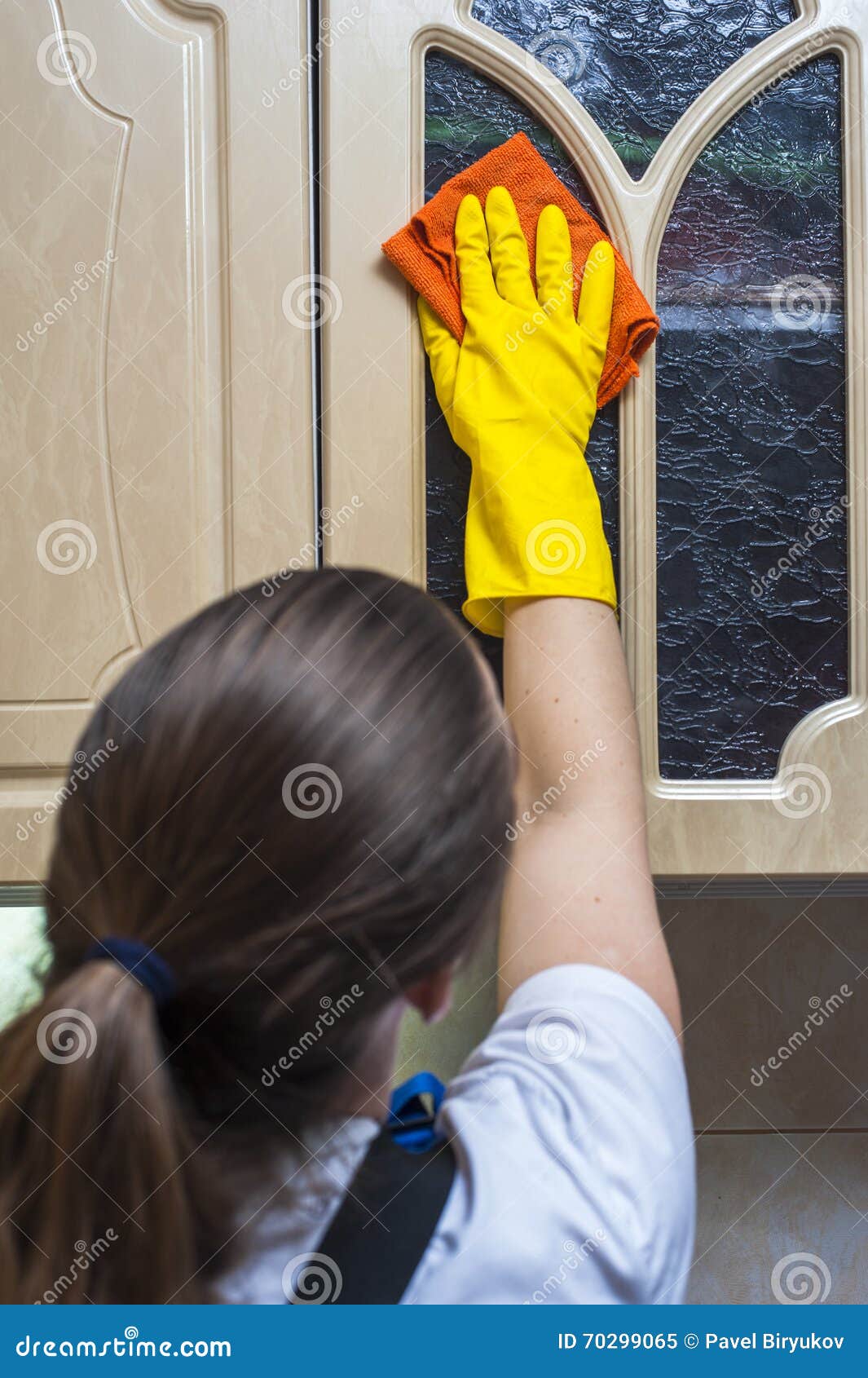 Woman Scrubbing Kitchen Cupboard with Rag Stock Image - Image of ...