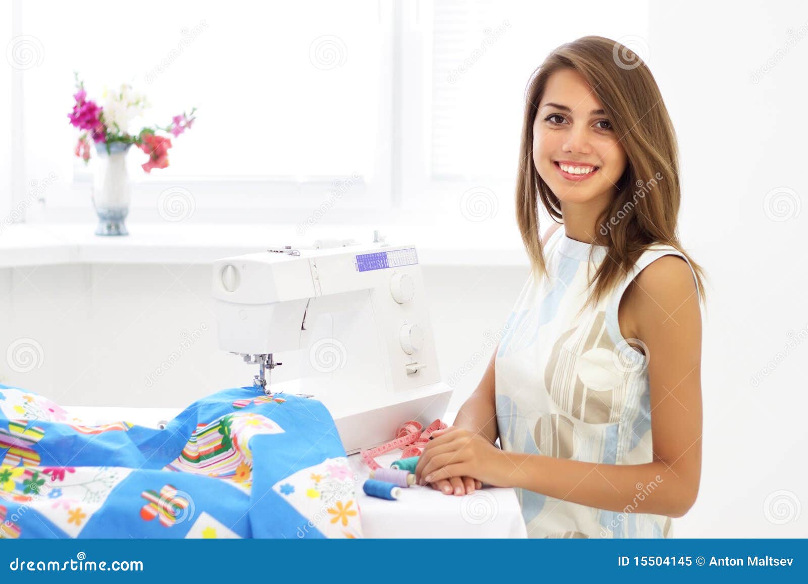Woman Seamstress and Sewing Machine Stock Image - Image of seated ...
