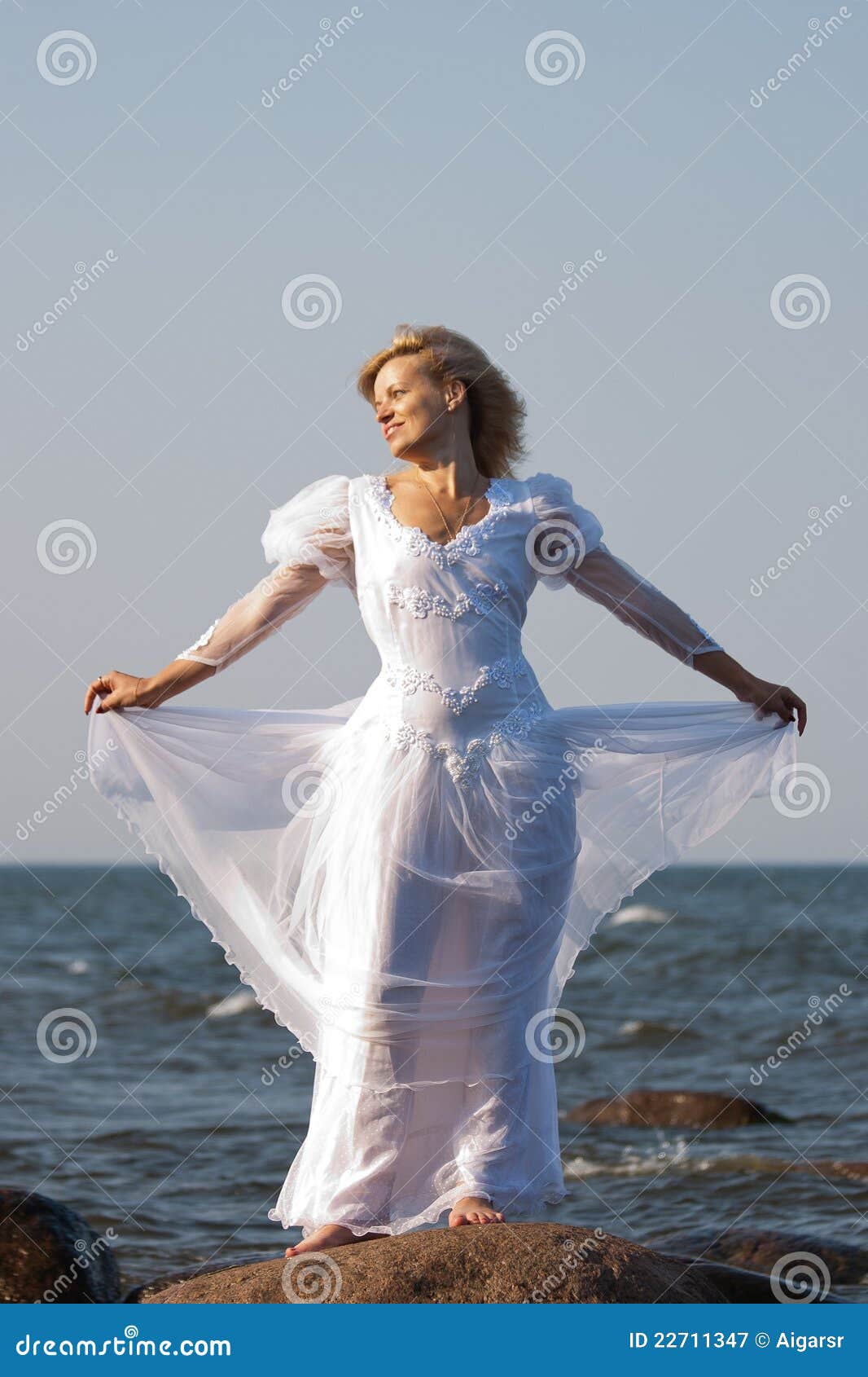 Woman in seaside stock image. Image of pretty, relaxing - 22711347