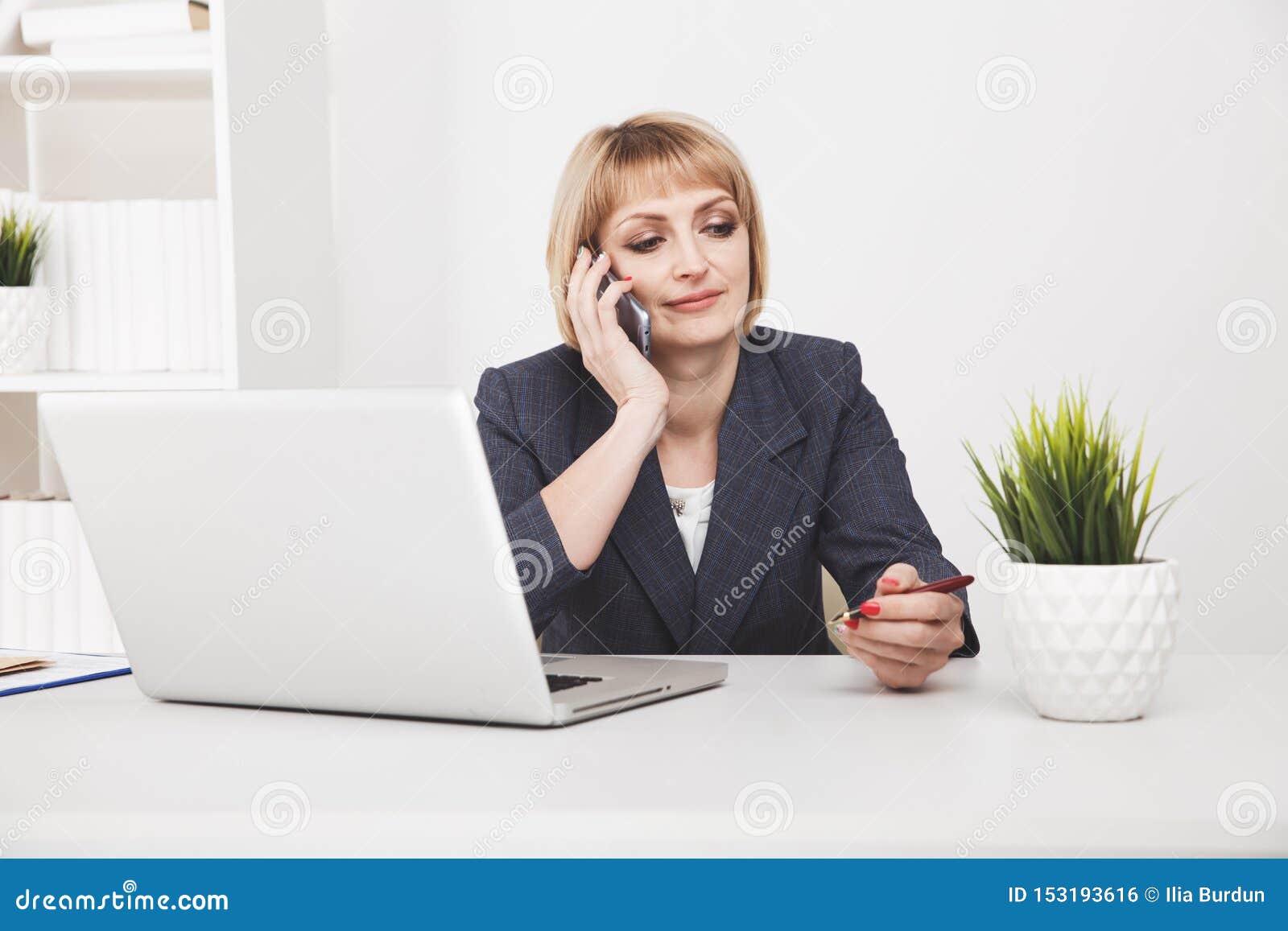 Woman Secretary Calling Sitting at Her Workplace. Stock Photo - Image ...