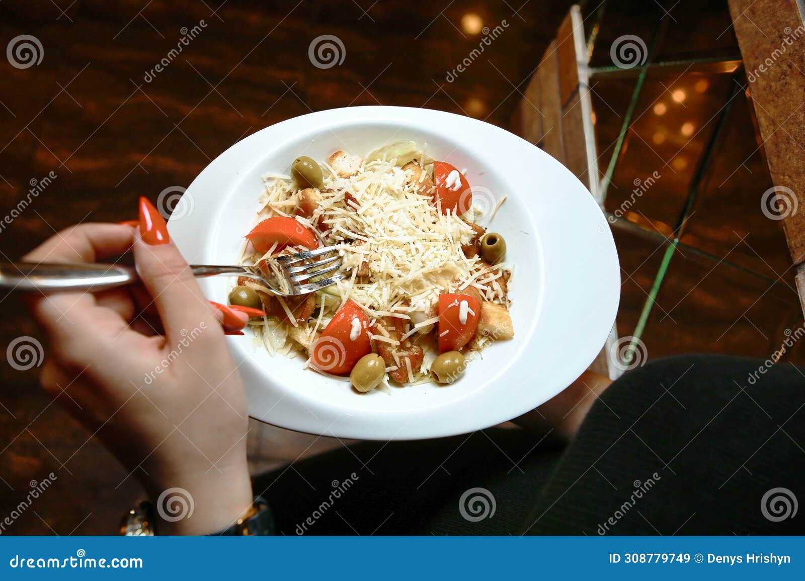 Woman Eating Bowl of Food with Fork Stock Image - Image of room, fork ...