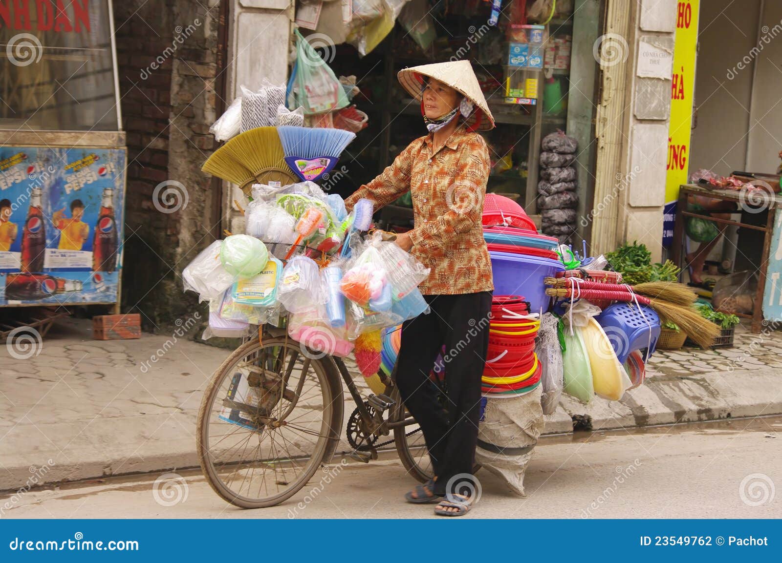 Woman Selling Brooms and Plastic Objects Editorial Photography - Image ...
