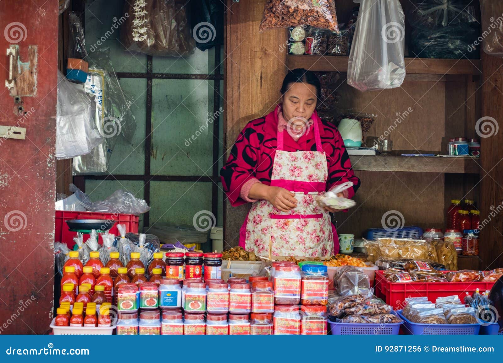 Woman is Selling Goods at the Market. Editorial Photo - Image of bags ...