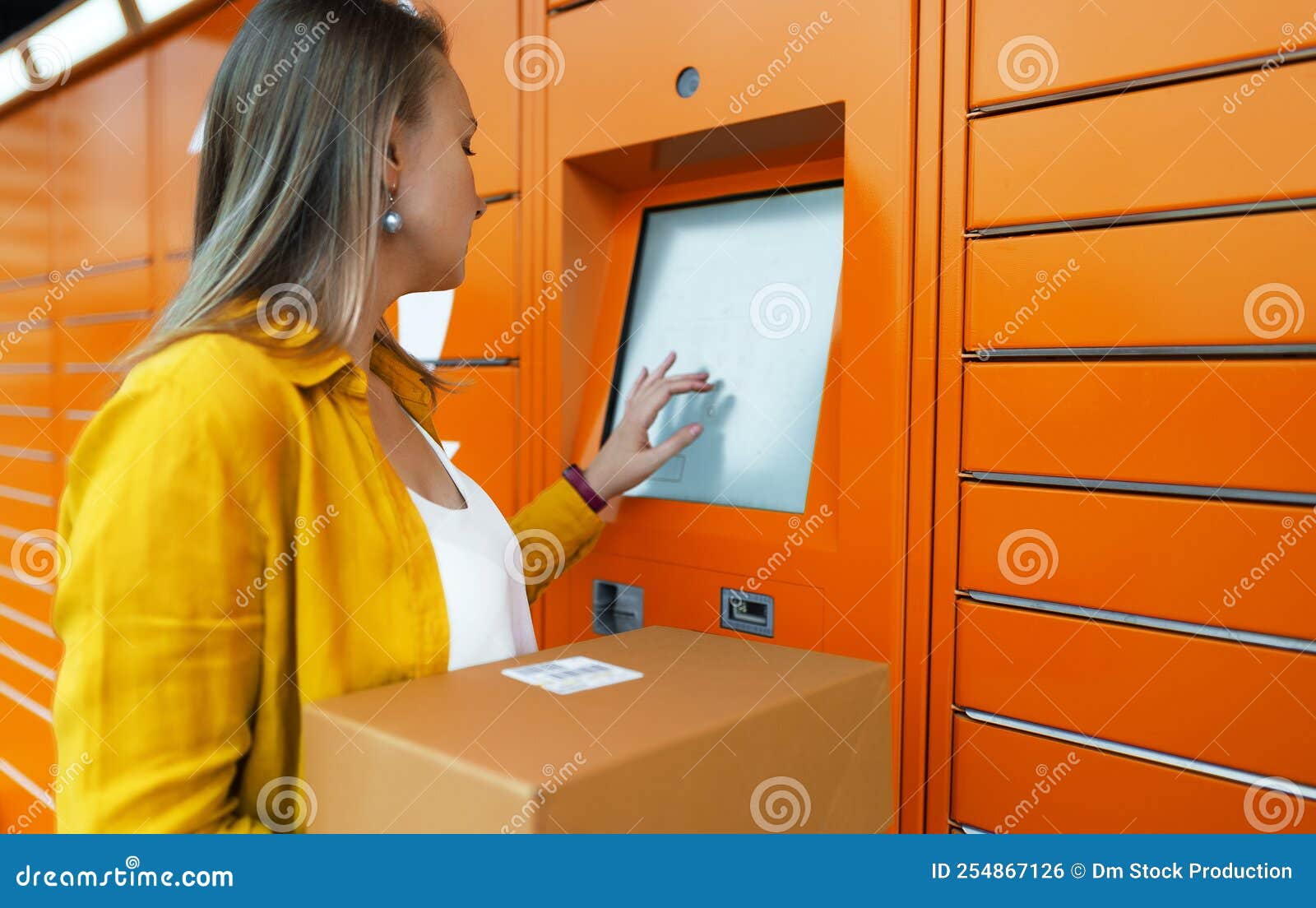 Woman sending mail stock photo. Image of logistic, machine - 254867126