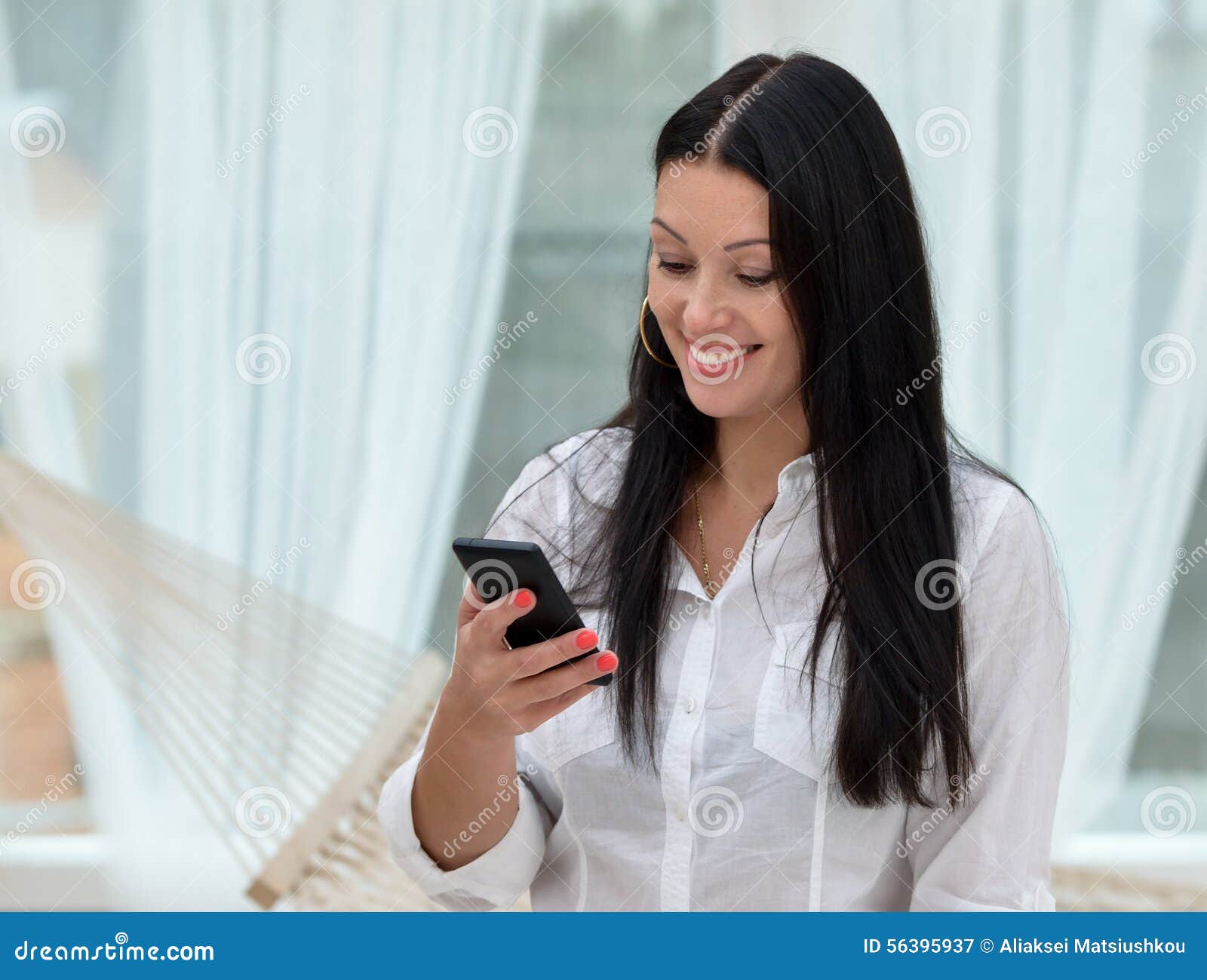 Woman Sending a Text Message from Her Cell Phone Stock Image - Image of ...