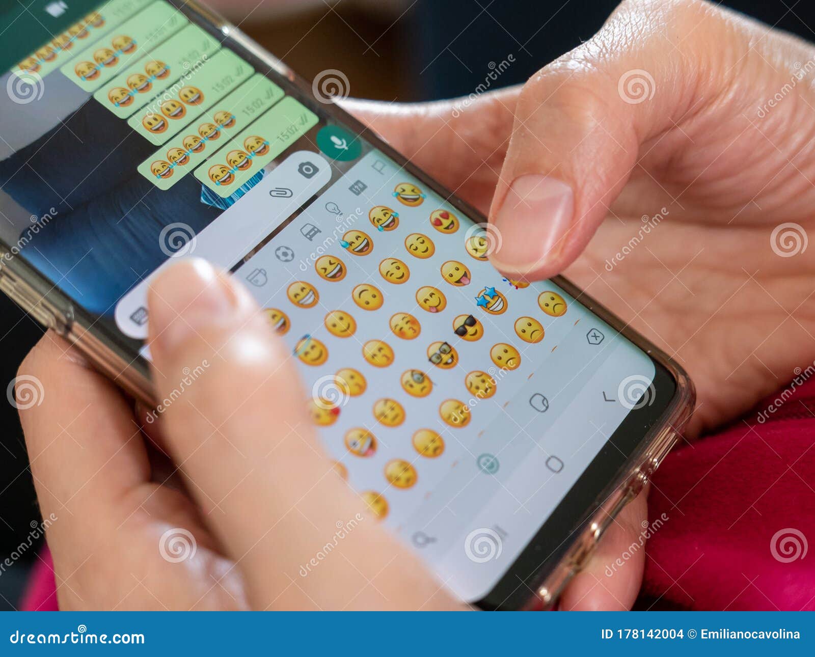 Woman Sends Emoticons on an Instant Messaging Application Stock Photo ...